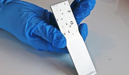 The Water Break Test as a Surface Measurement Gauge